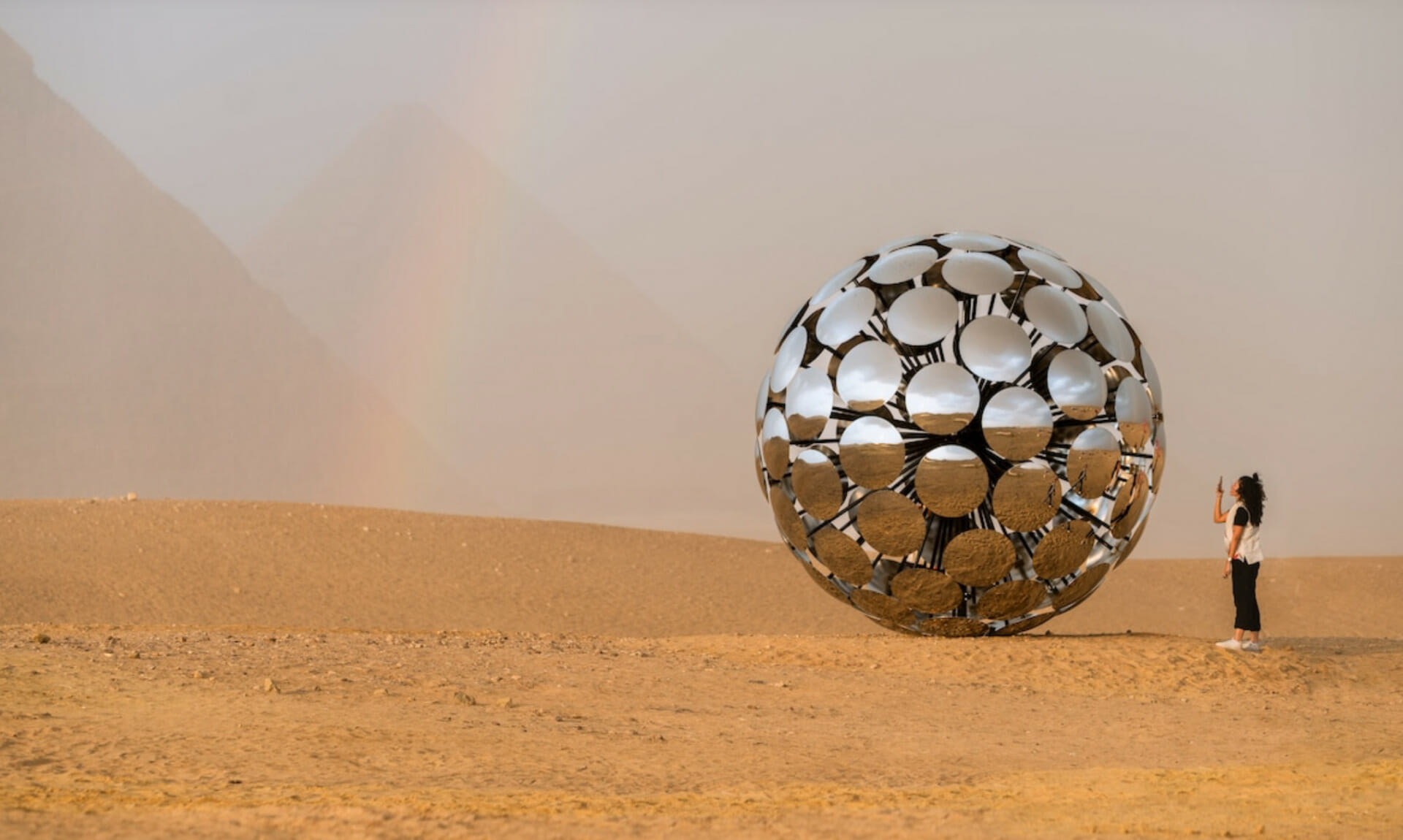 SHFT | Read | Pyramids Are a Dramatic Backdrop for a Mirrored Orb ...